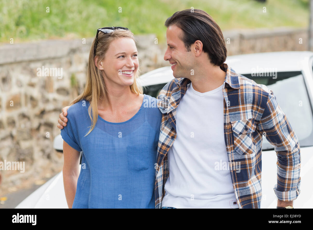 Couple smiling each other Stock Photo - Alamy
