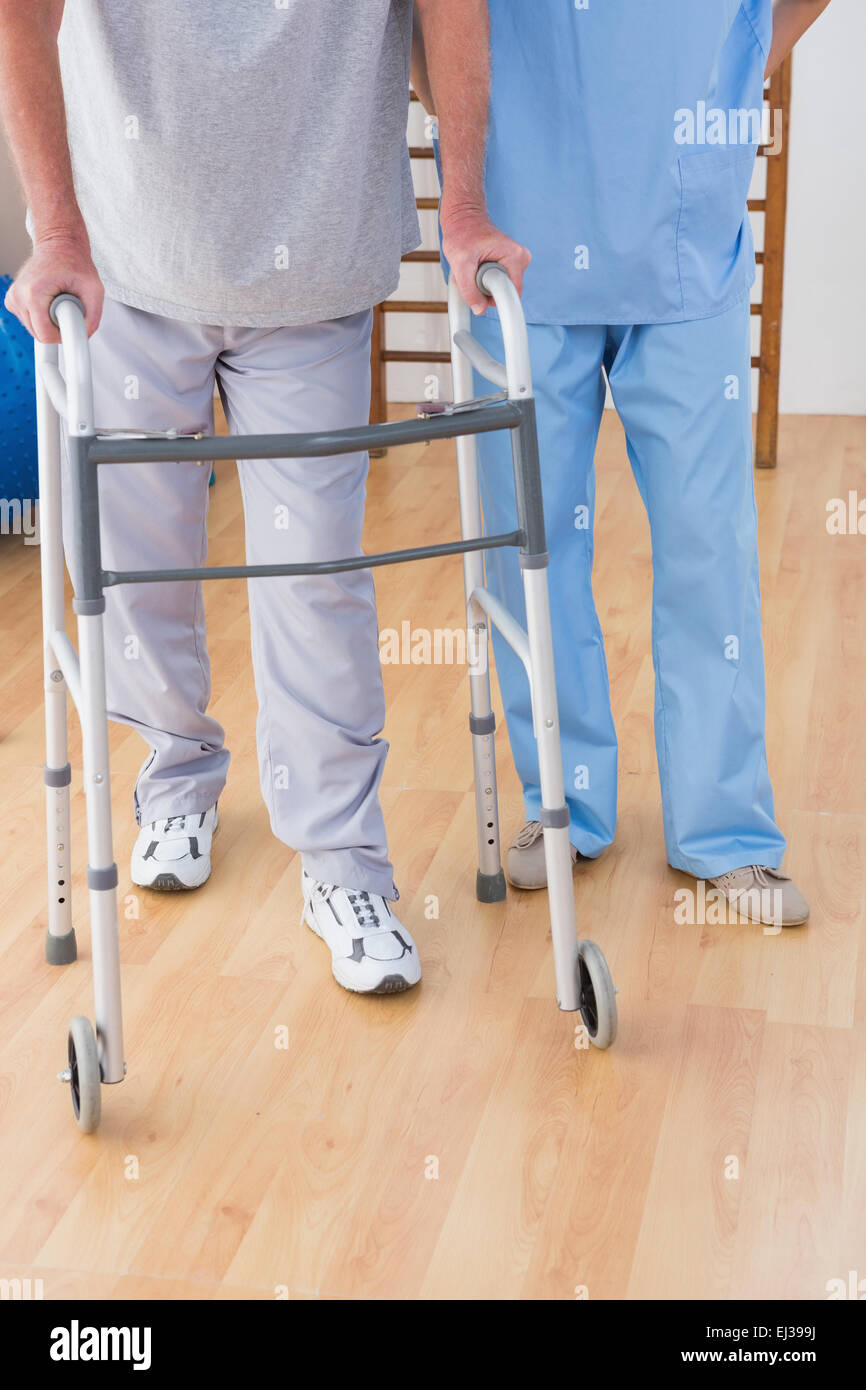 Senior man standing walking frame hi-res stock photography and images ...