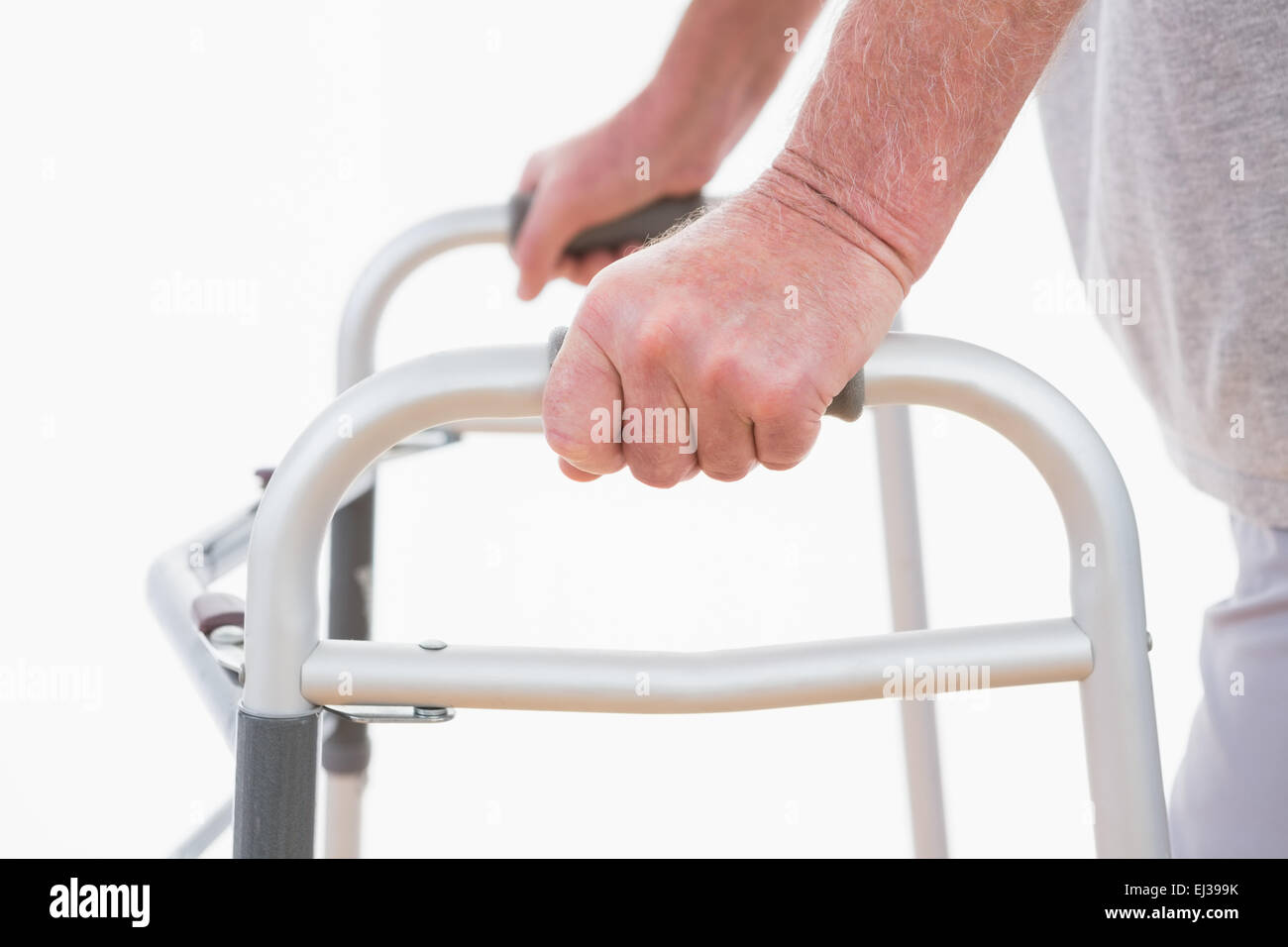 Senior man standing walking frame hi-res stock photography and images ...