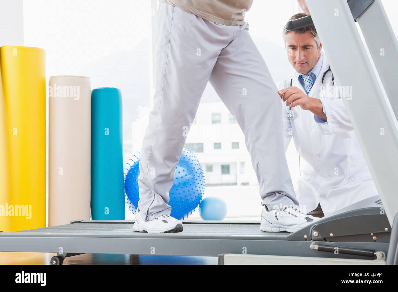 Man crouching walking hi-res stock photography and images - Alamy