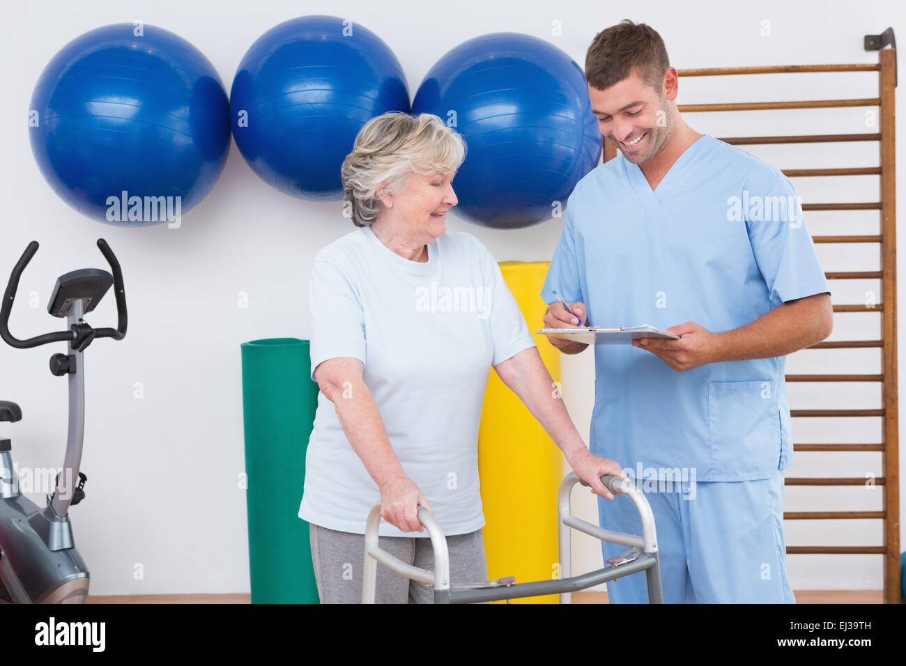 Elderly man walking zimmer frame hi-res stock photography and images ...