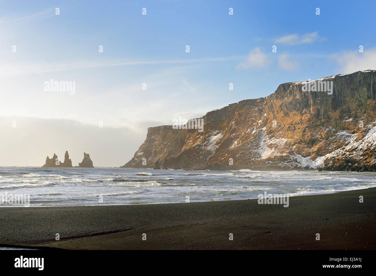 Volcanic black sand beach in Iceland in Winter Stock Photo - Alamy