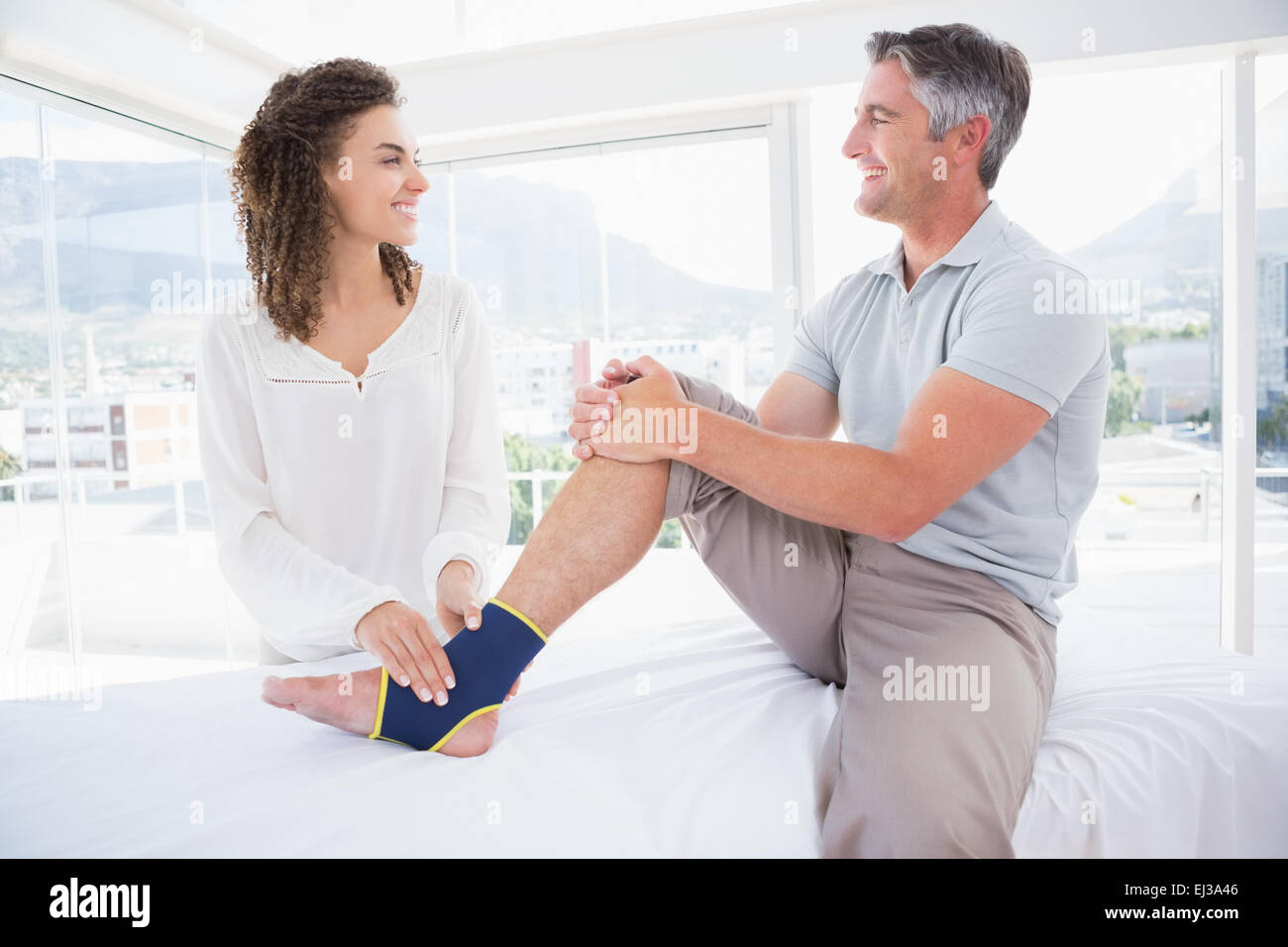 Doctor examining patient foot hi-res stock photography and images - Alamy