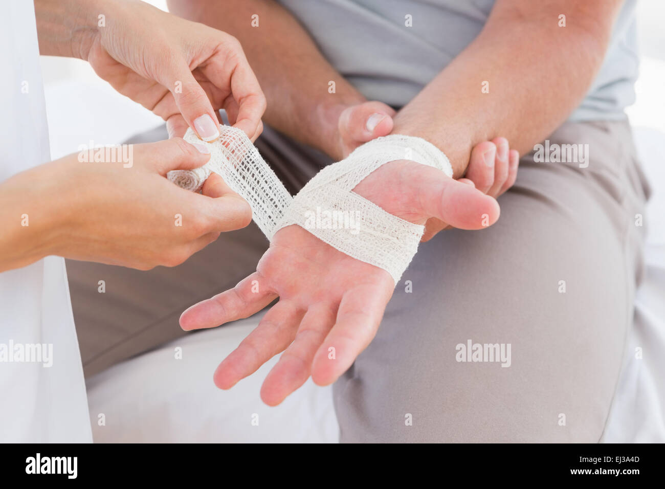 Hand bandaging hi-res stock photography and images - Alamy