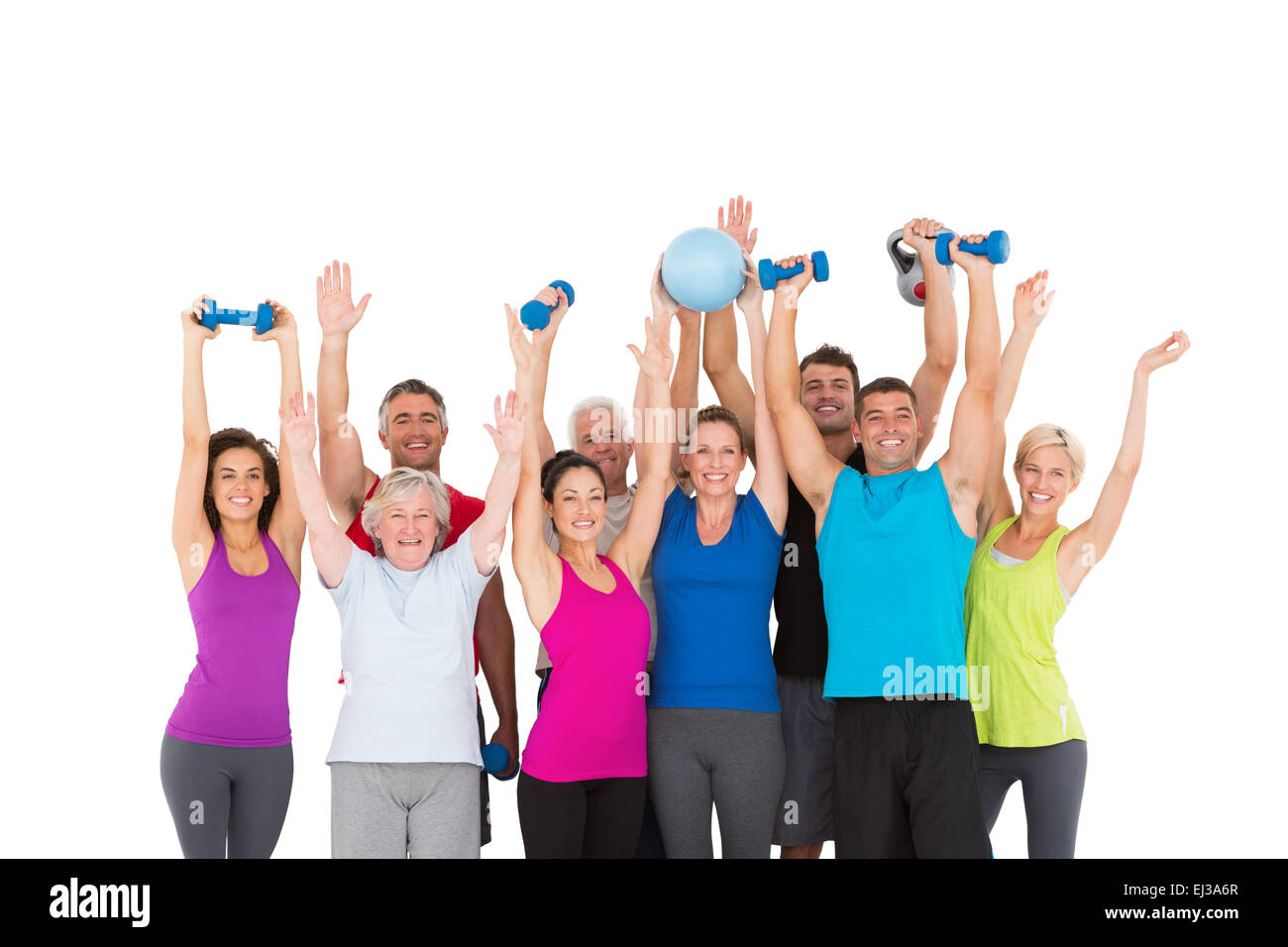 Cheerful people holding exercise equipment Stock Photo - Alamy