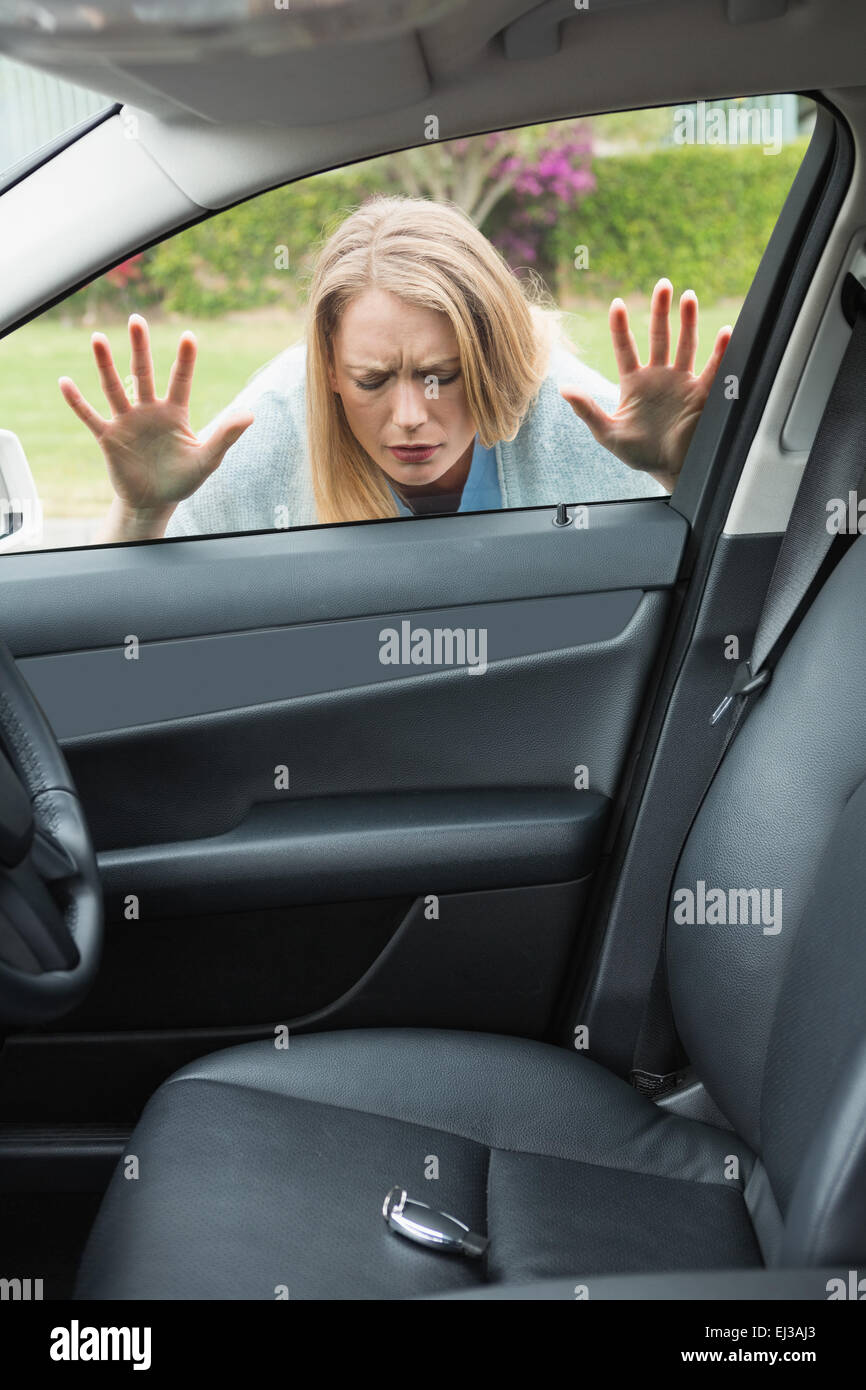 Woman forgot her key Stock Photo - Alamy
