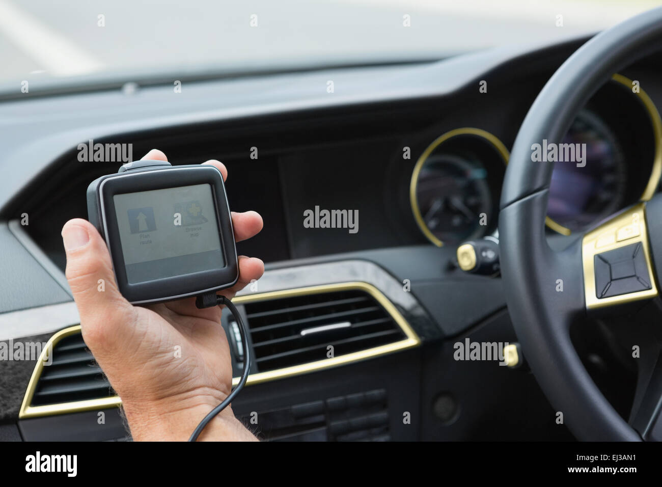 Man using satellite navigation system Stock Photo - Alamy