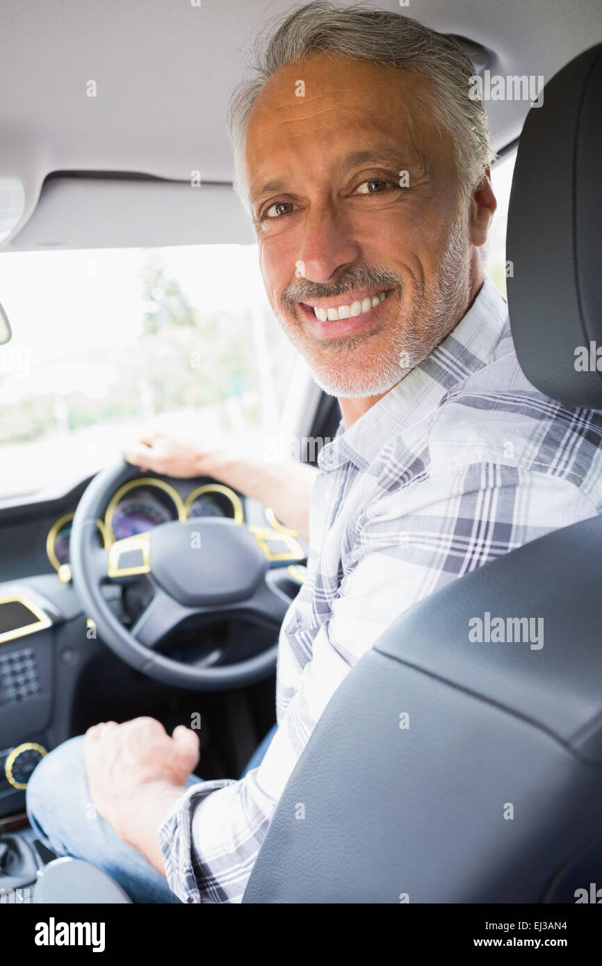 Man smiling while driving Stock Photo - Alamy