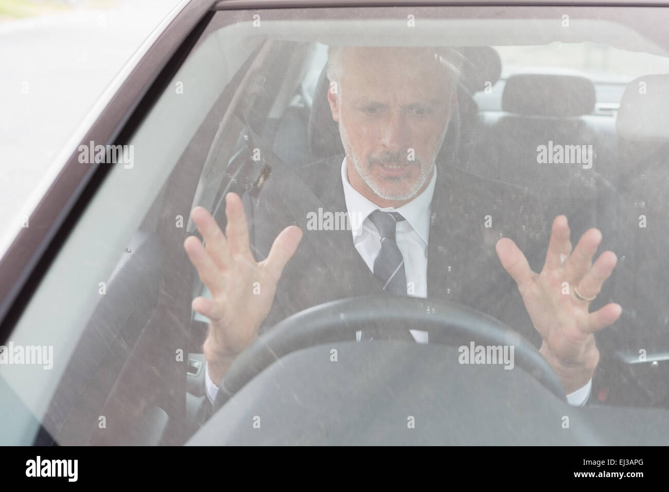 Nervous man suit hi-res stock photography and images - Alamy