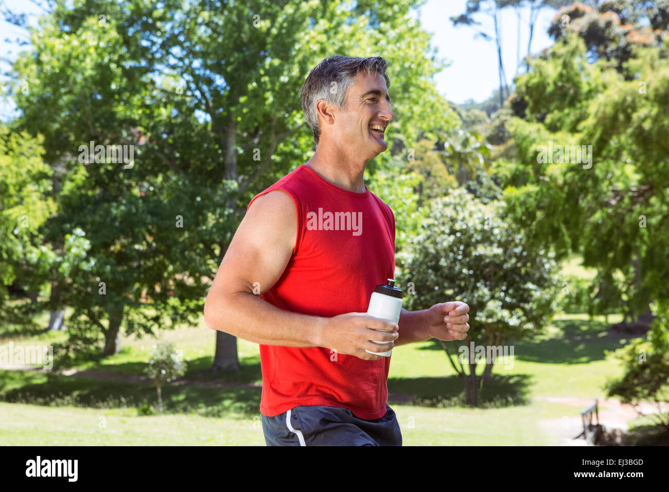 Fit attractive body in 40s exercising hi-res stock photography and ...