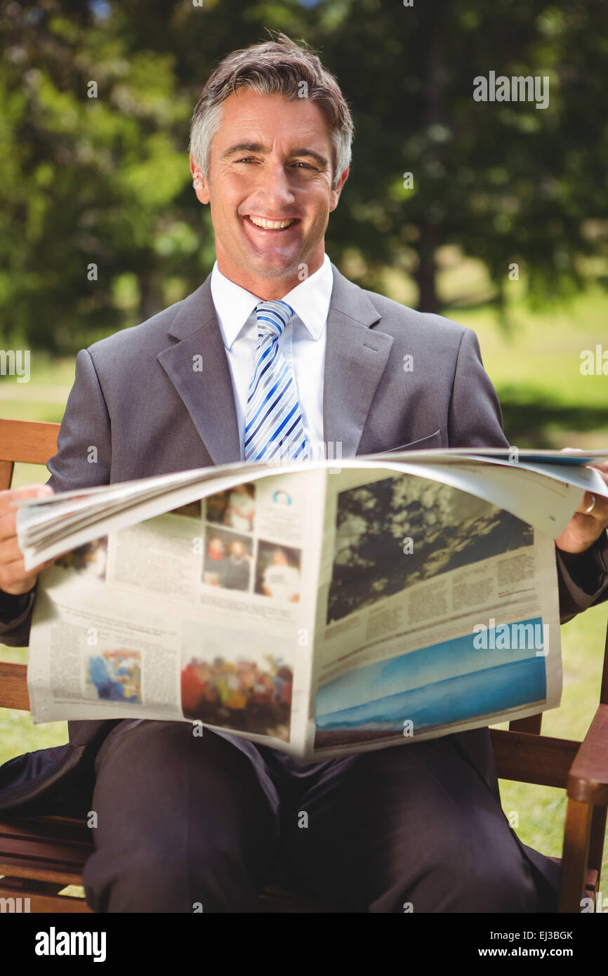 Reading newspaper in nature hi-res stock photography and images - Alamy