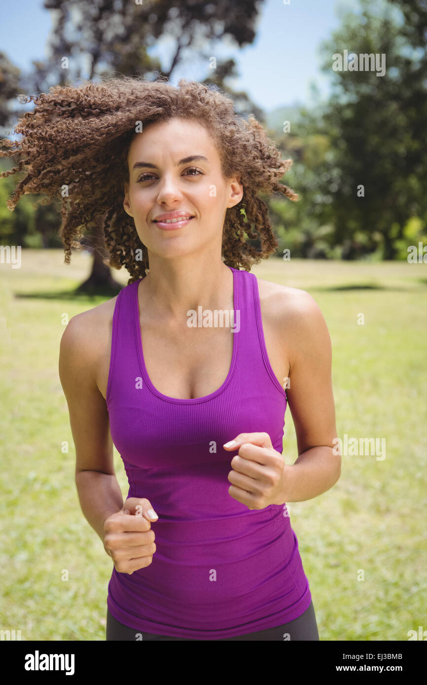 Woman jogging in the park hi-res stock photography and images - Alamy