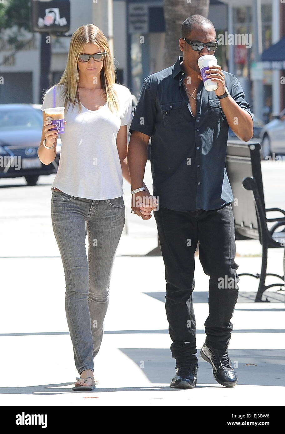 Eddie Murphy and his girlfriend Paige Butcher walk hand in hand after ...