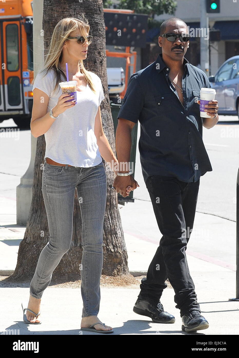 Eddie Murphy and his girlfriend Paige Butcher walk hand in hand after ...