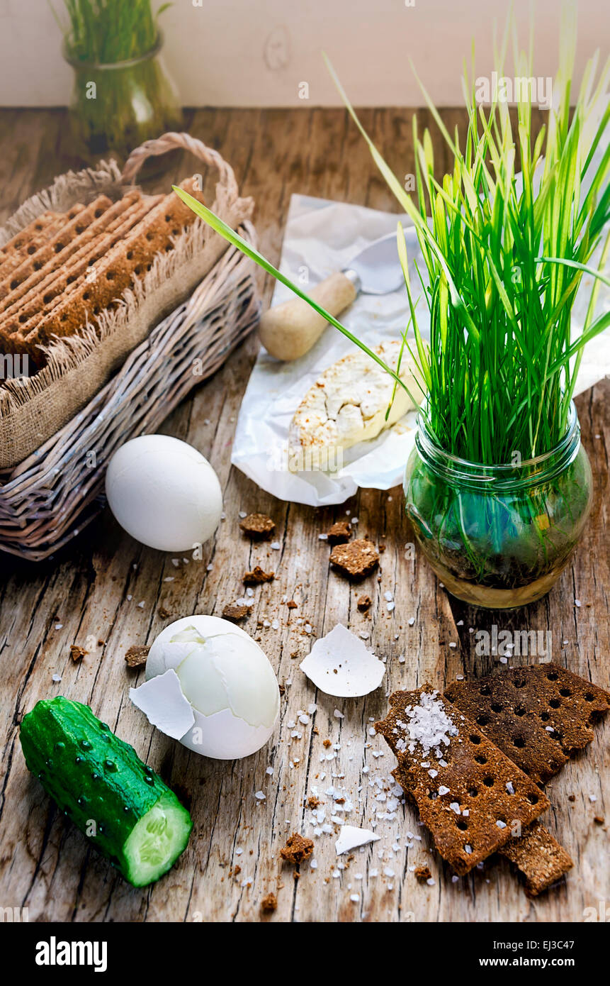 Hard boiled eggs, cucumber, camembert cheese, germinated seeds of grass ...