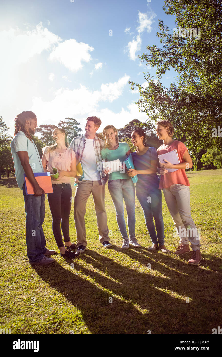 Happy students outside on campus Stock Photo - Alamy