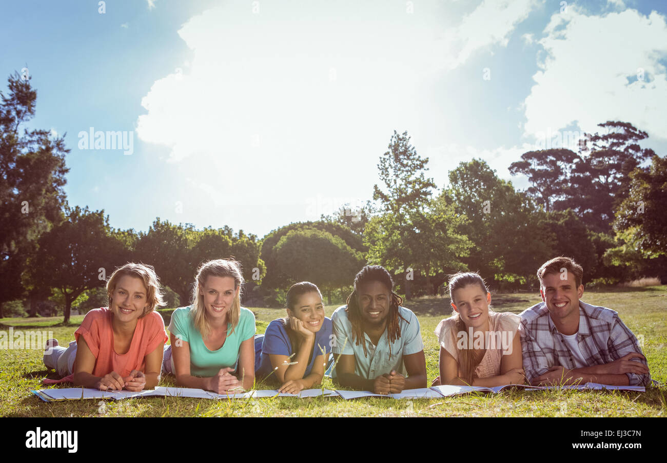 Students studying outside on campus Stock Photo - Alamy