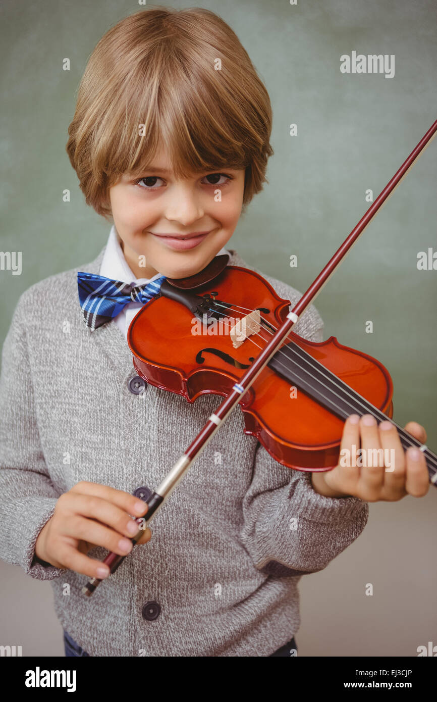 Portrait of cute little boy playing violin Stock Photo - Alamy