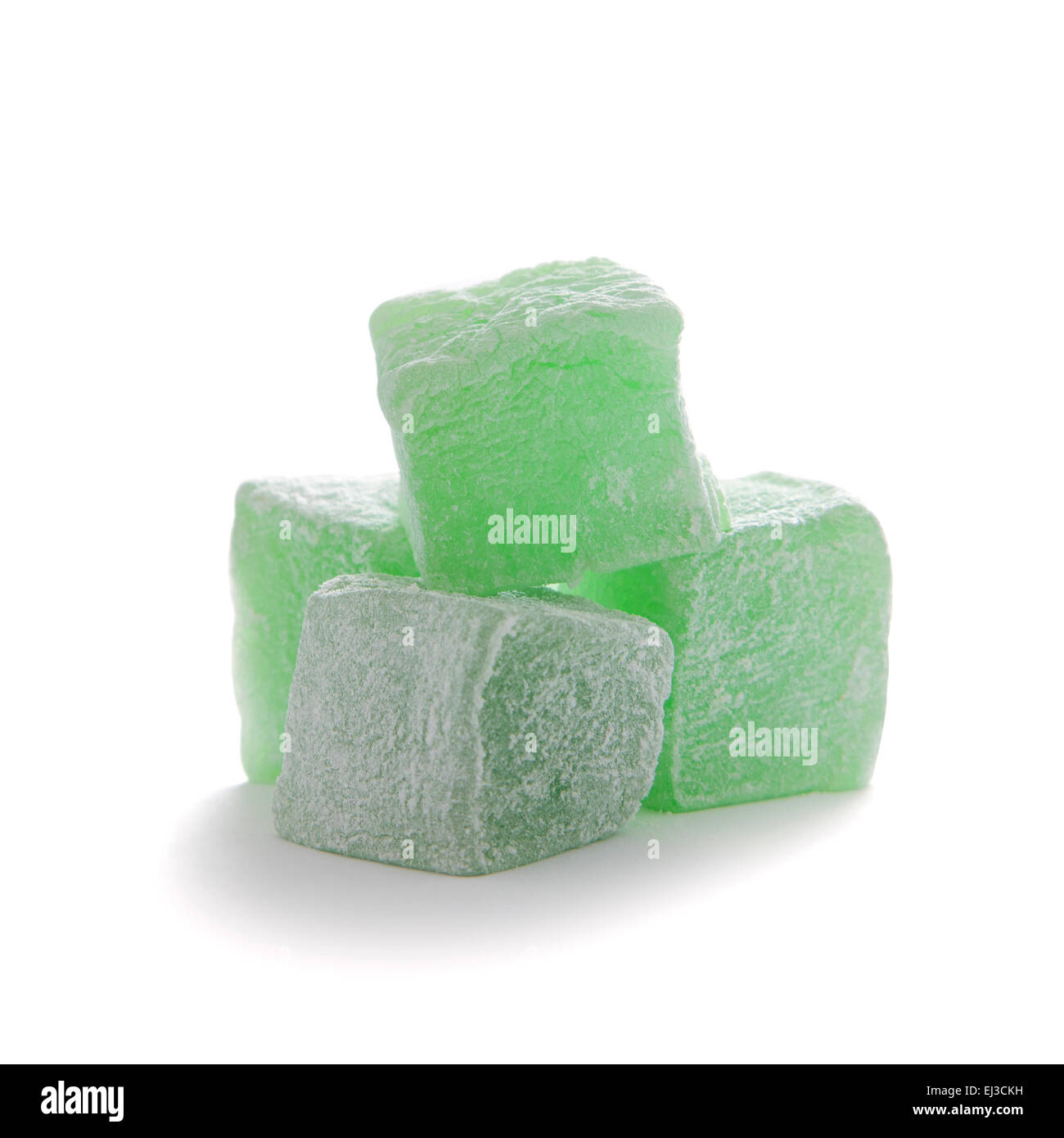 Cubes of green lokum isolated over white Stock Photo - Alamy