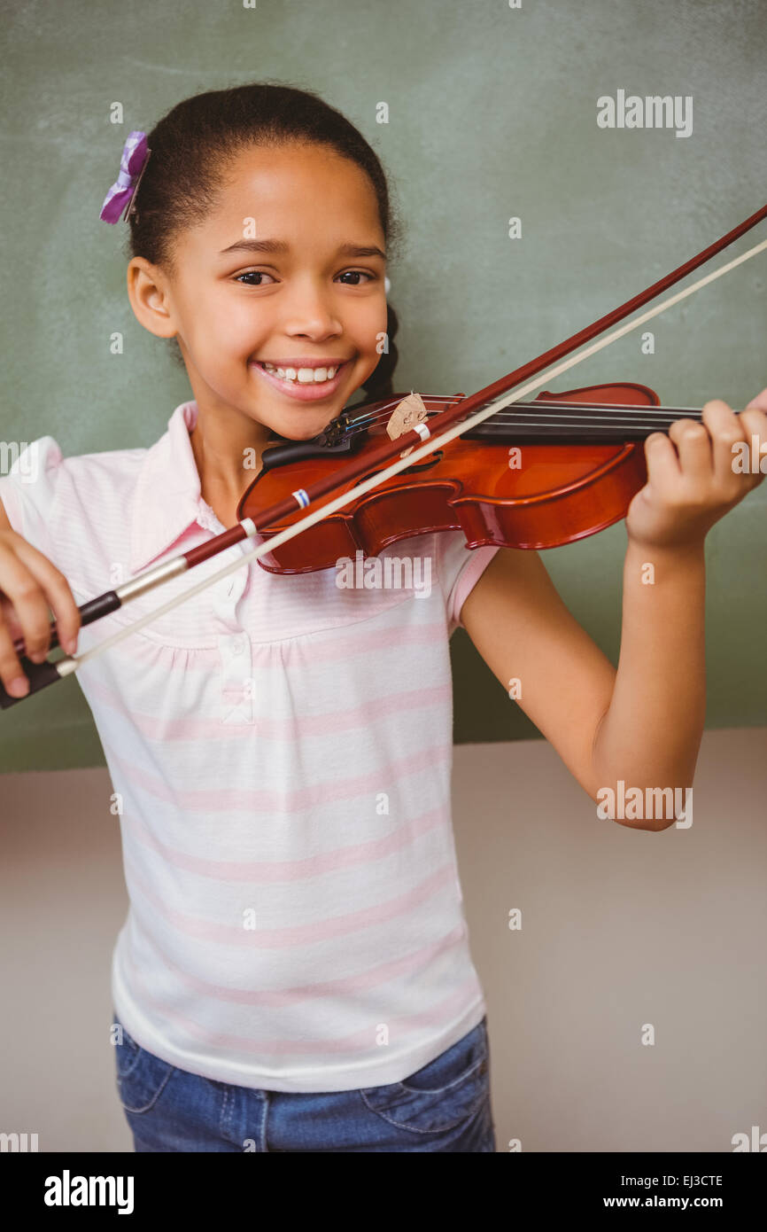 Portrait of cute little girl playing violin Stock Photo - Alamy