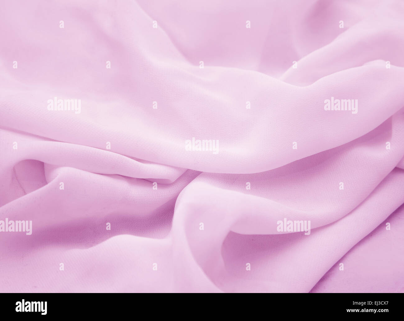 Pleats of pink chiffon close-up for background Stock Photo - Alamy