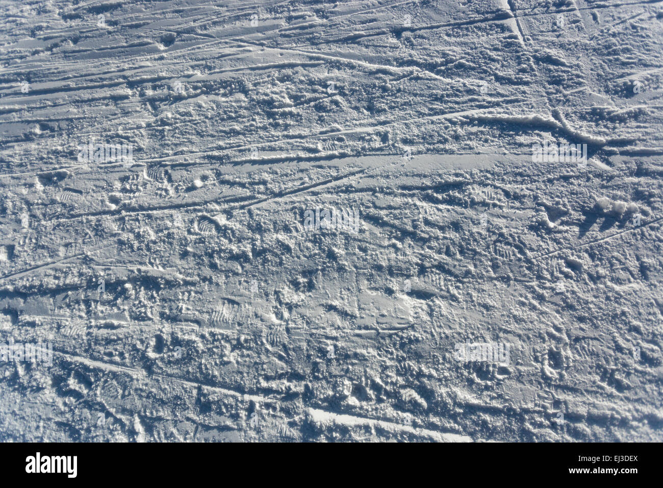 Closeup photo of skis marks on snow slope Stock Photo - Alamy