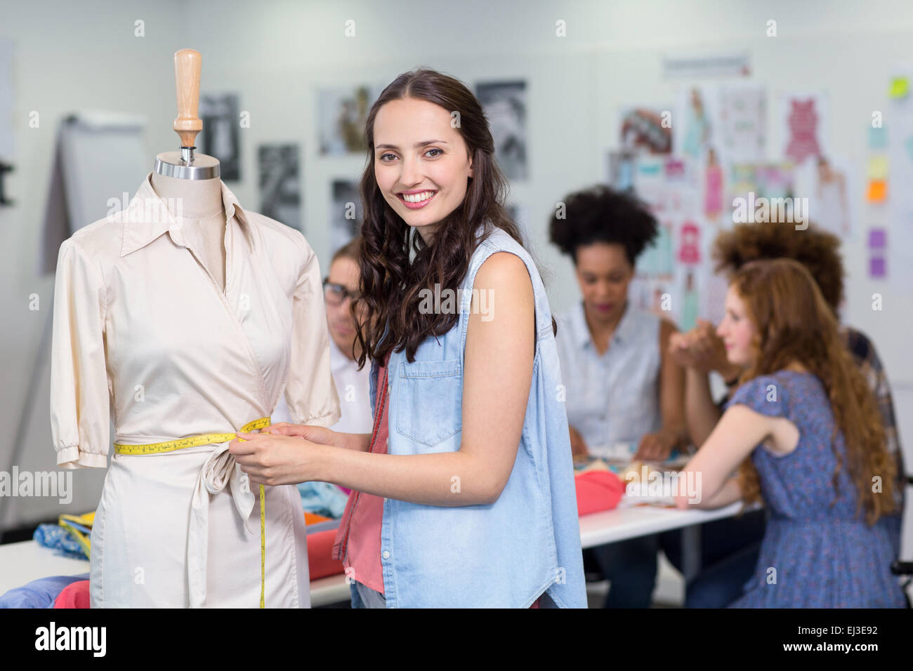 Confident female fashion designer Stock Photo - Alamy