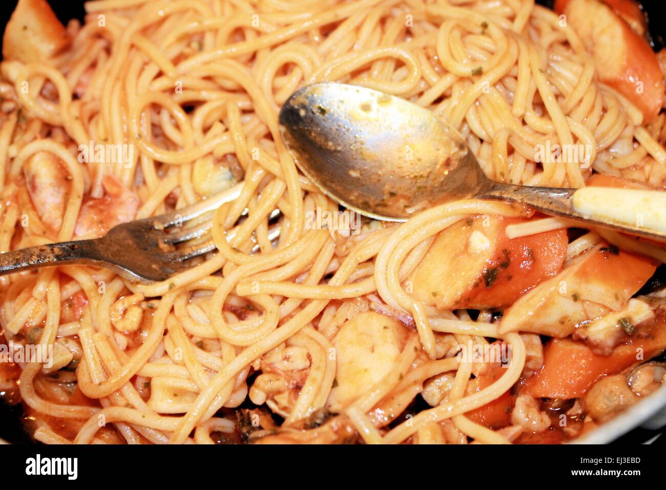 pasta spaghetti with mixed fish sauce Stock Photo - Alamy