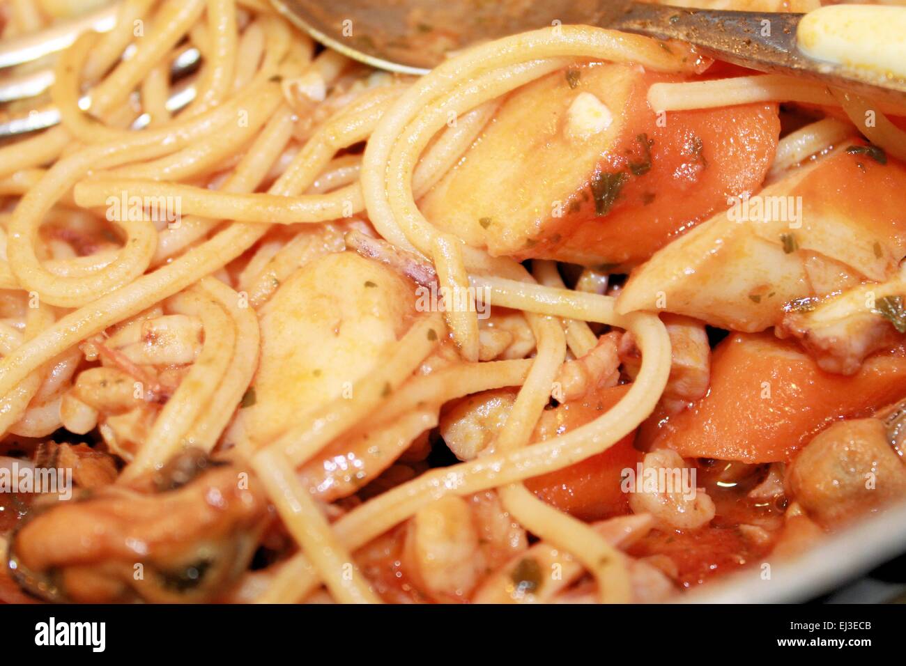 pasta spaghetti with mixed fish sauce Stock Photo - Alamy