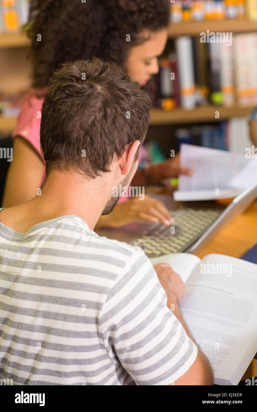 College students in library Stock Photo - Alamy