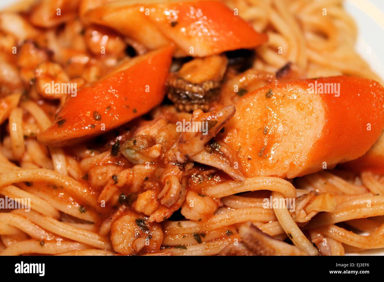 pasta spaghetti with mixed fish sauce Stock Photo - Alamy