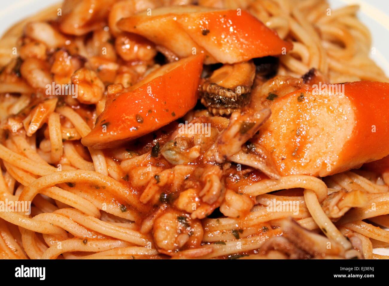 pasta spaghetti with mixed fish sauce Stock Photo - Alamy