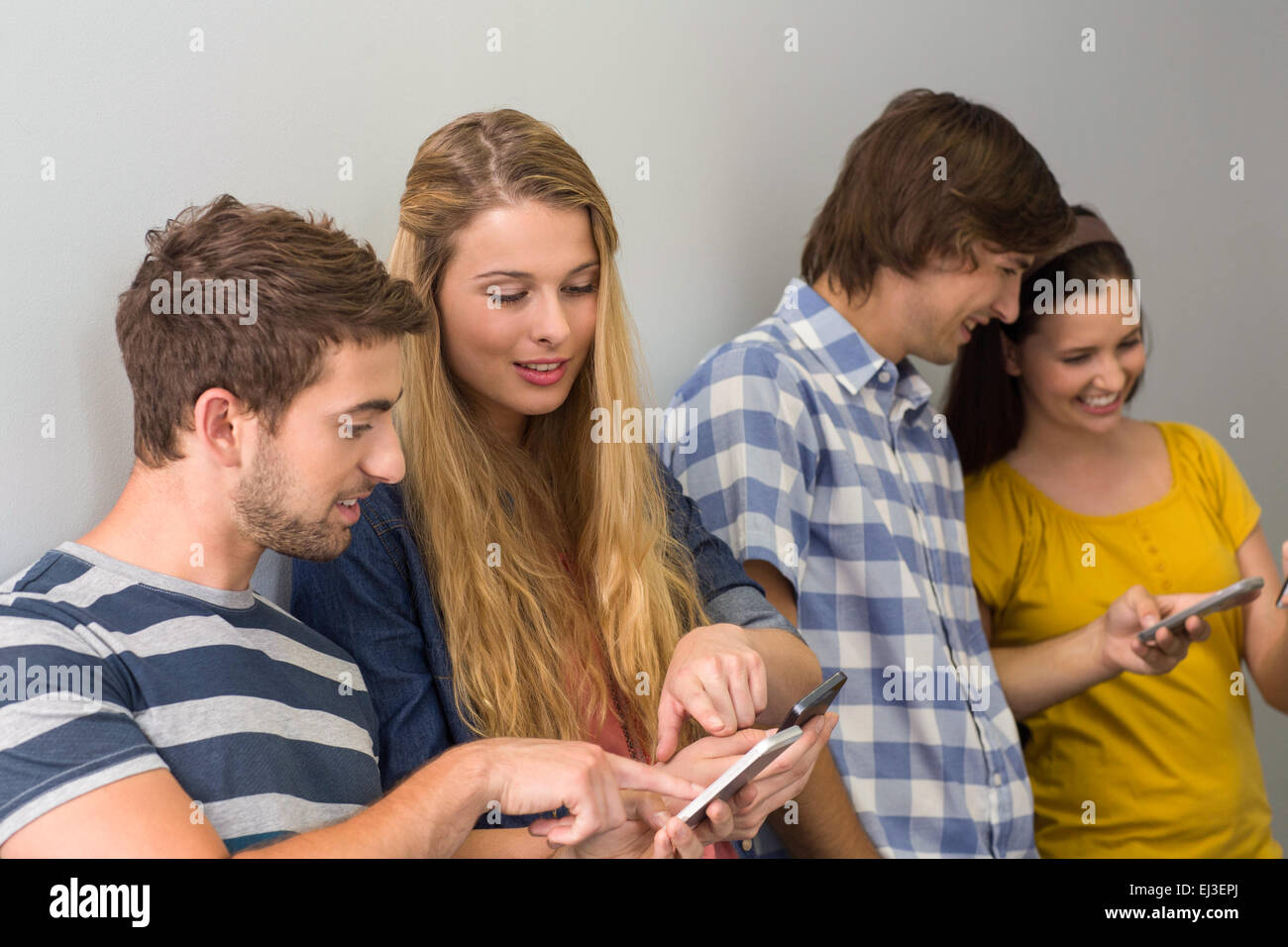 College students using cellphones Stock Photo - Alamy