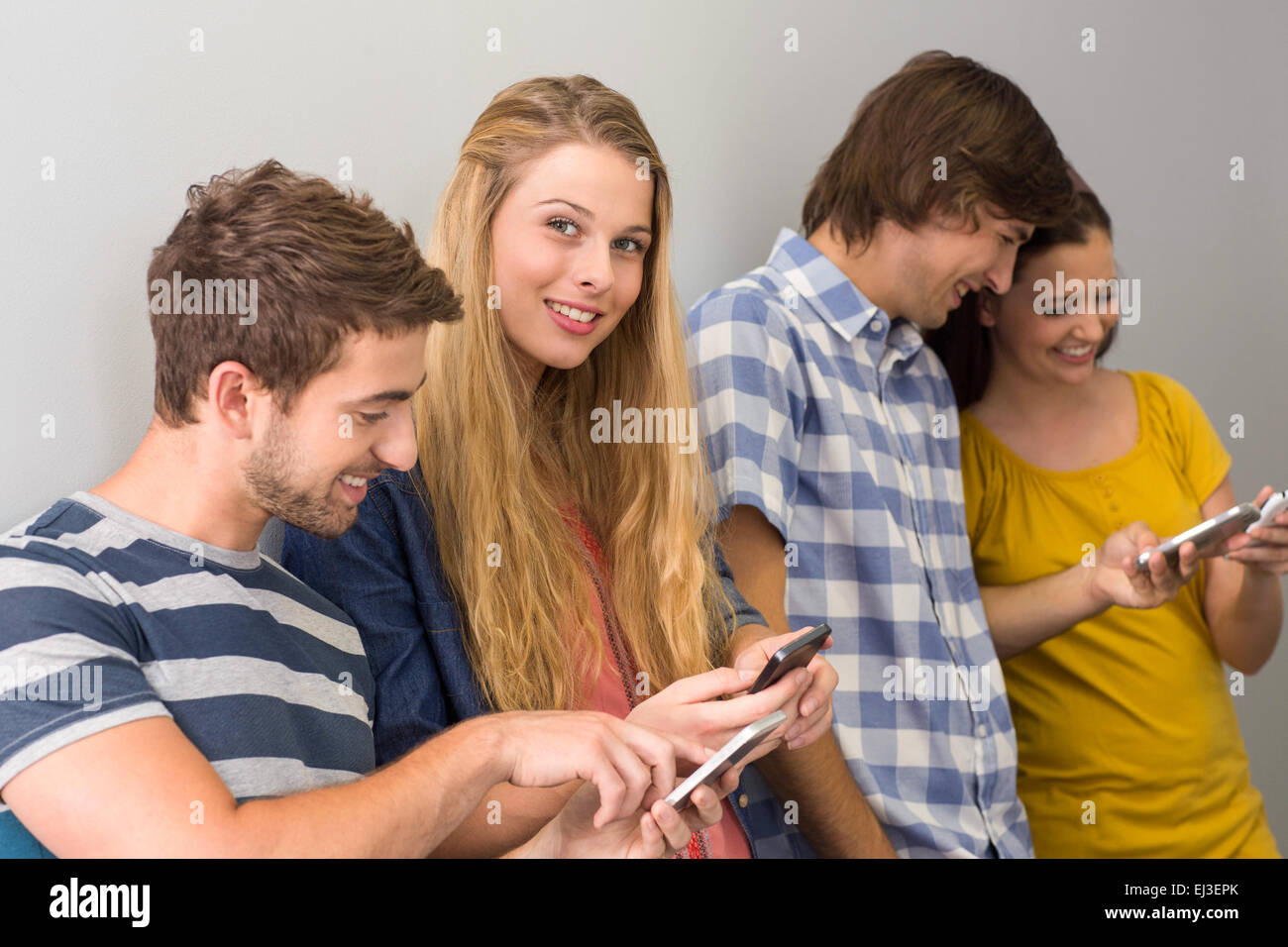 College students using cellphones Stock Photo - Alamy