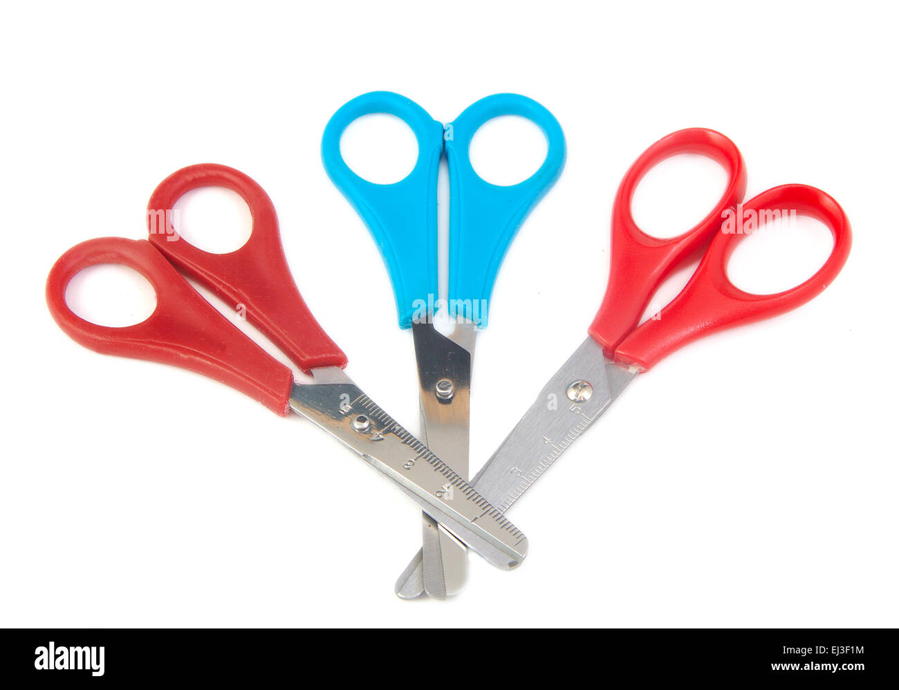 Three closed blue and red scissors for kids on white background Stock ...