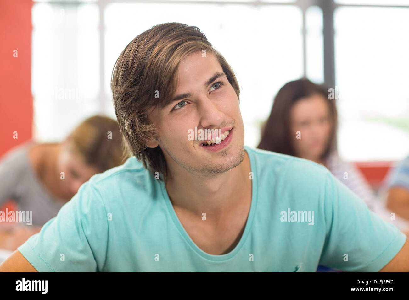 Male student in the classroom Stock Photo - Alamy