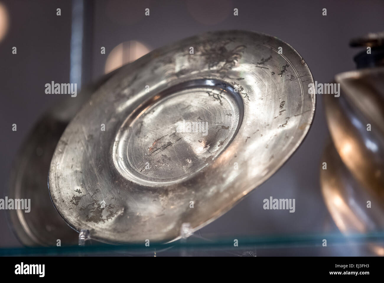 Closeup photo of old silver dish at museum Stock Photo - Alamy