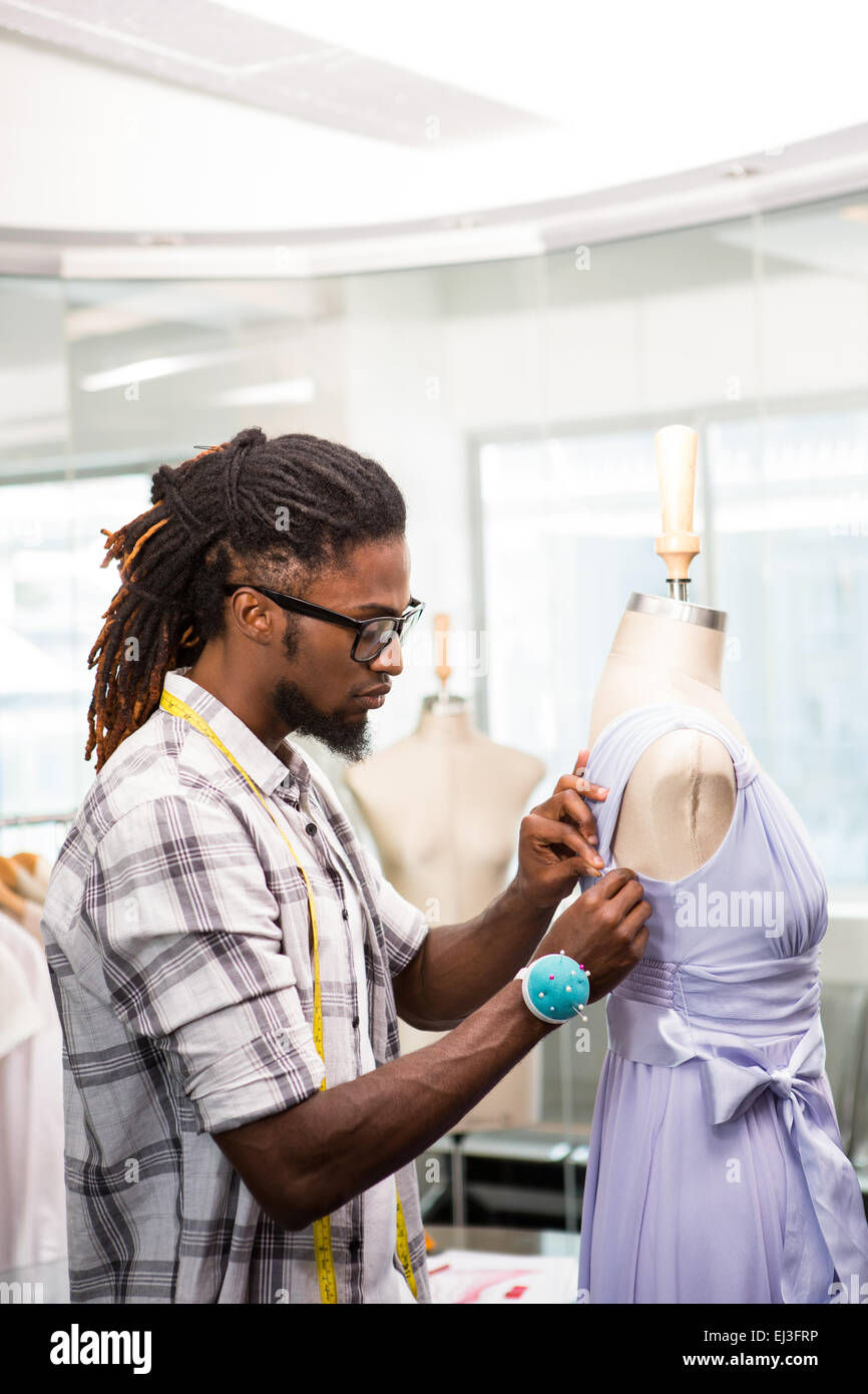 Male fashion designer and mannequin Stock Photo - Alamy