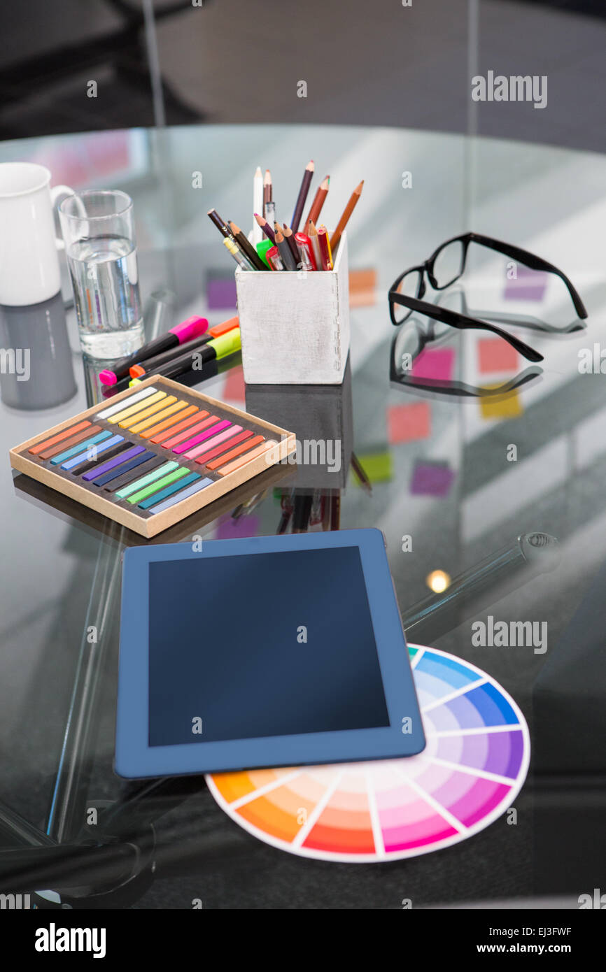 Colour samples and digitizer on desk Stock Photo - Alamy