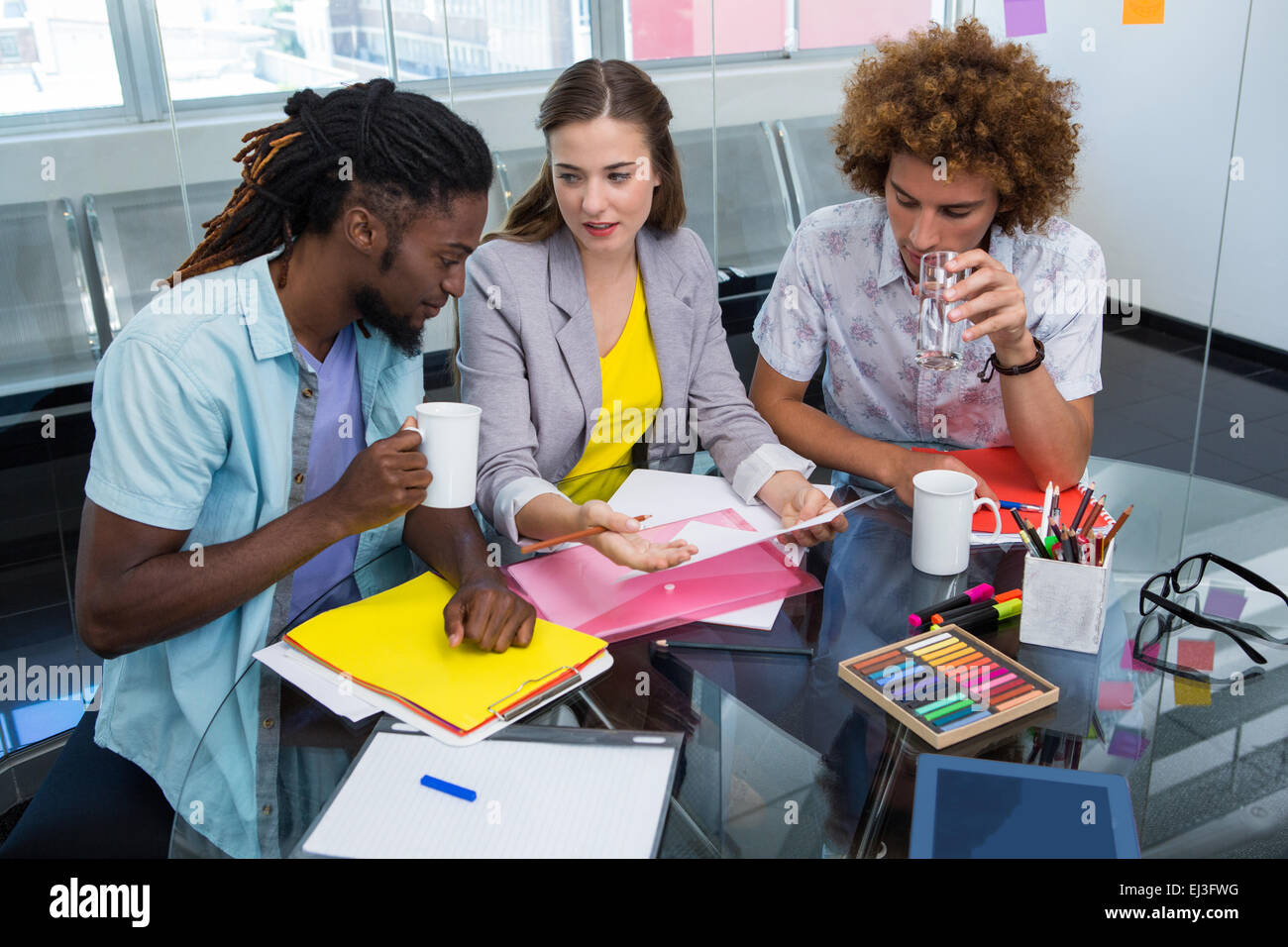 Creative business people working at desk Stock Photo - Alamy