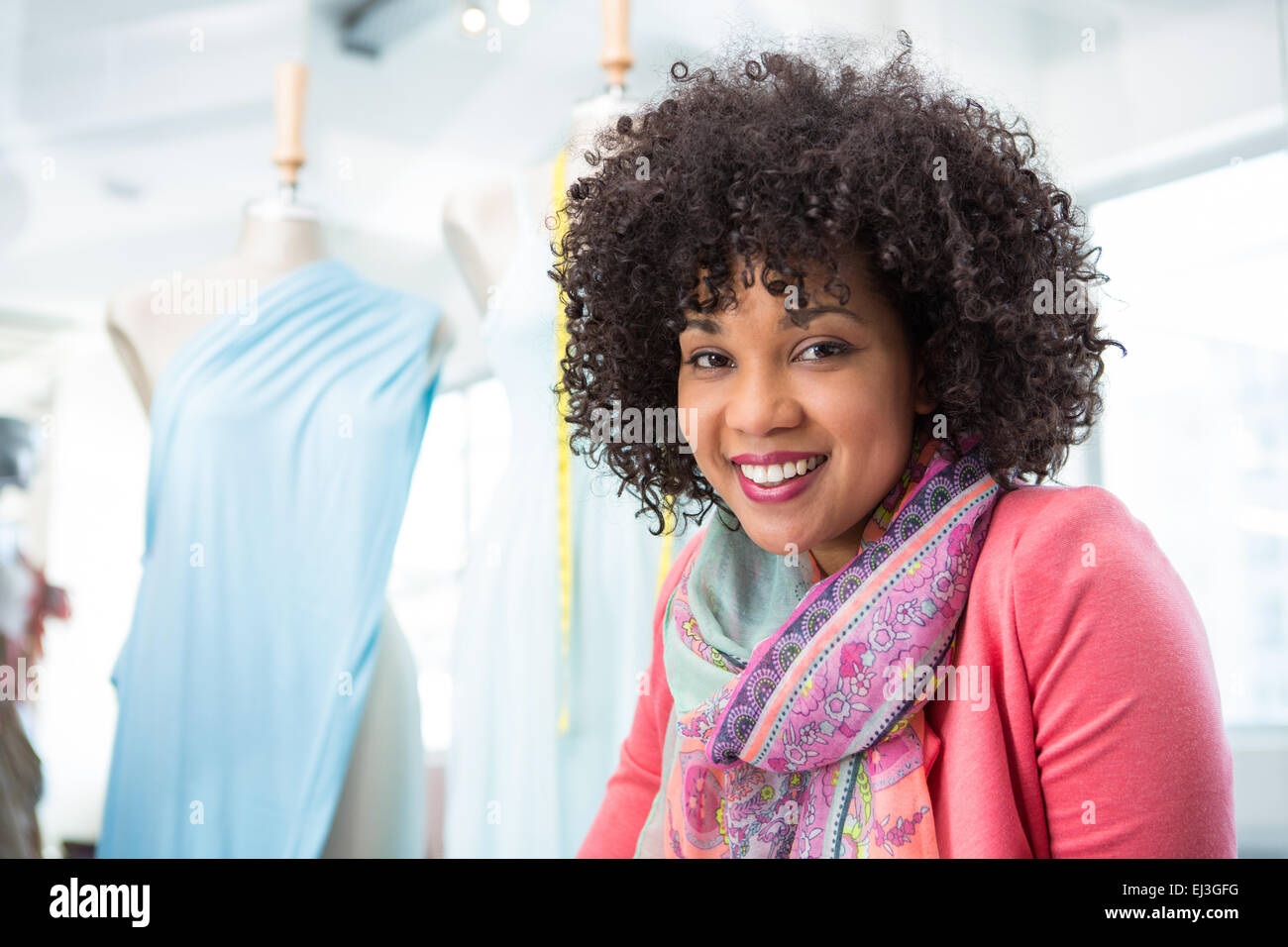 Confident female fashion designer Stock Photo - Alamy