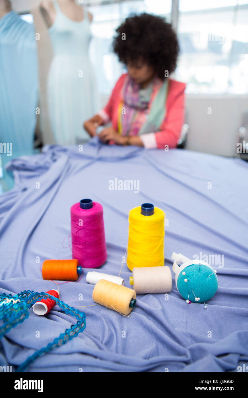 Close up of fashion designers table Stock Photo - Alamy