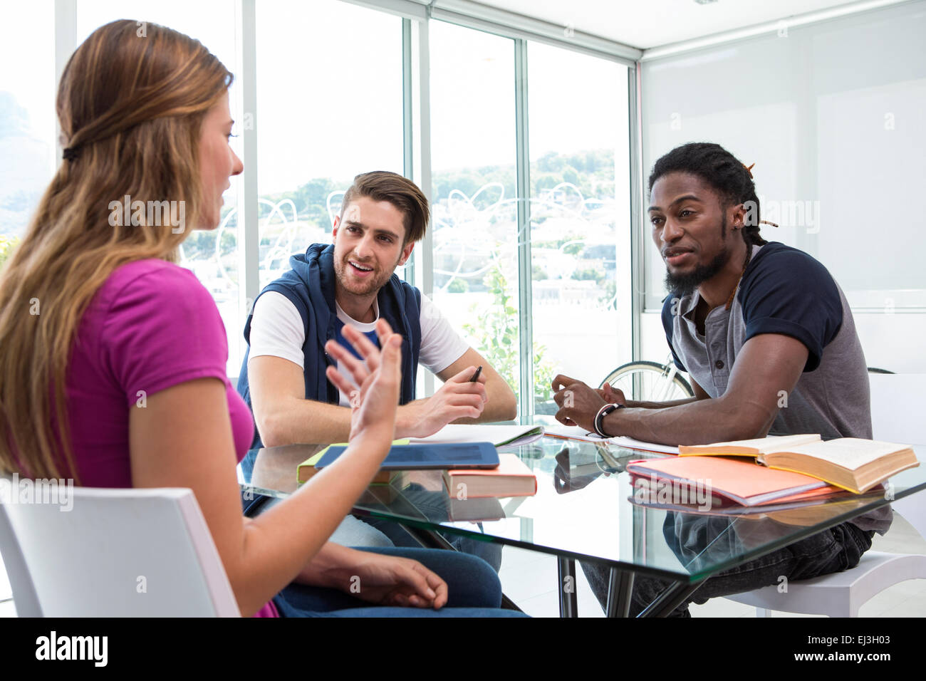Happy creative team papers hi-res stock photography and images - Alamy