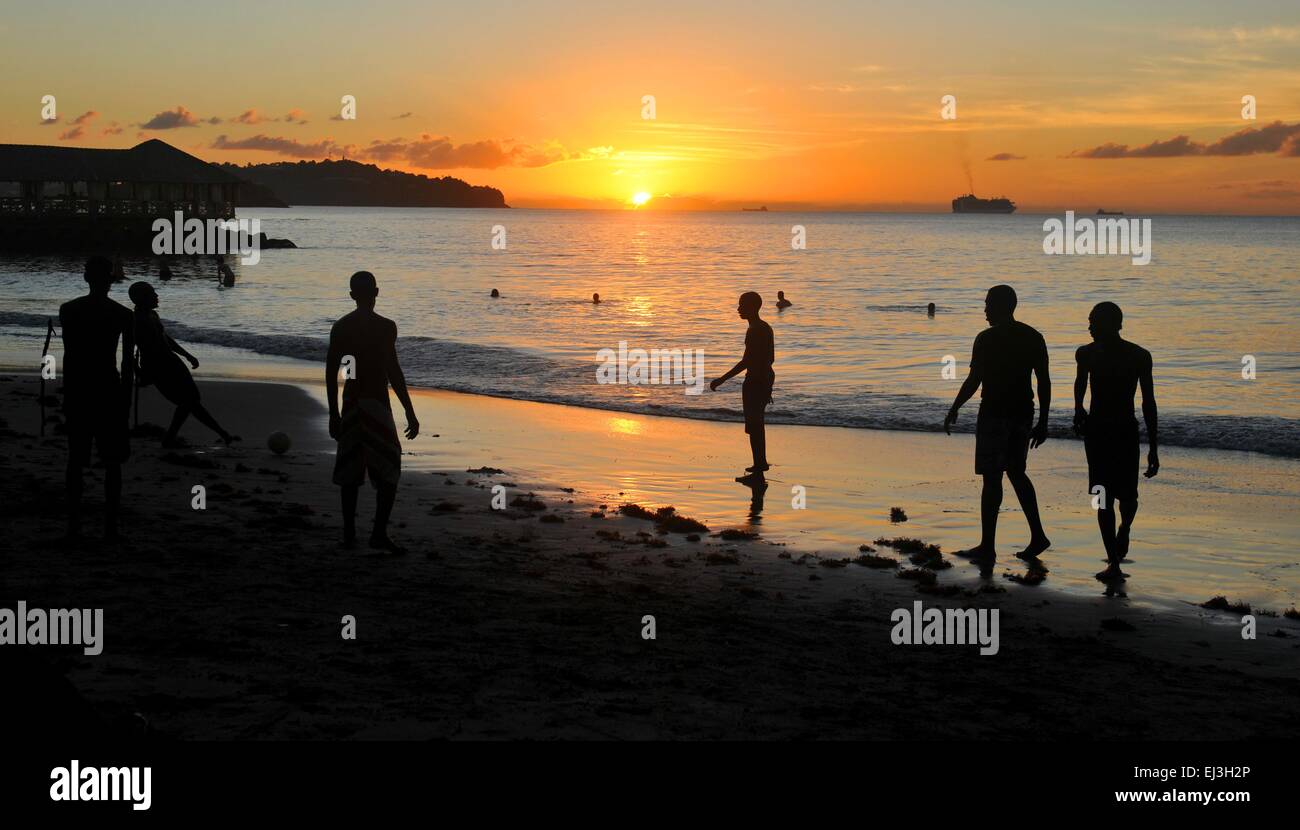 Silhouettes of people at sunset Stock Photo - Alamy
