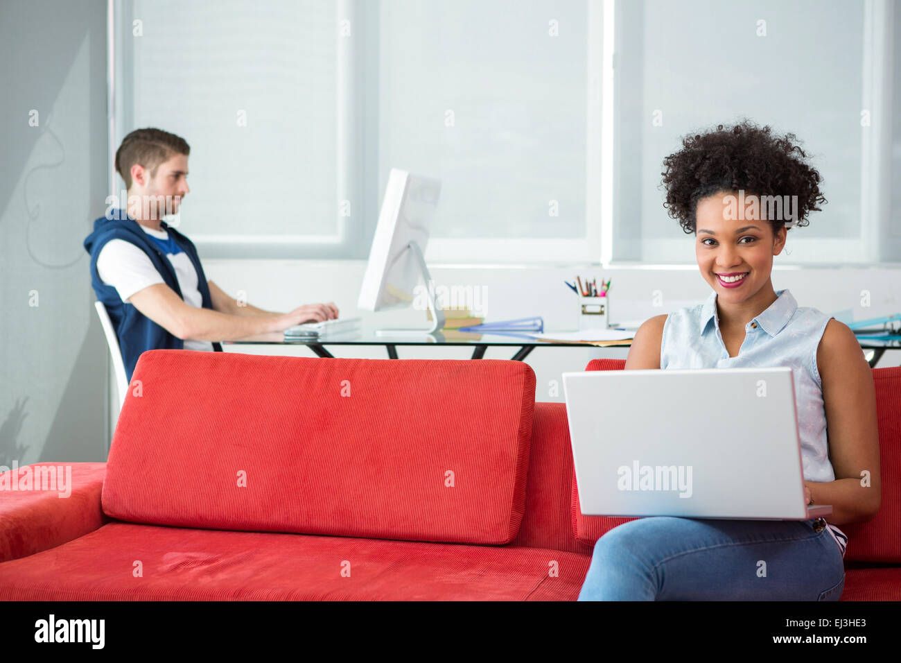 Creative team using computers Stock Photo - Alamy