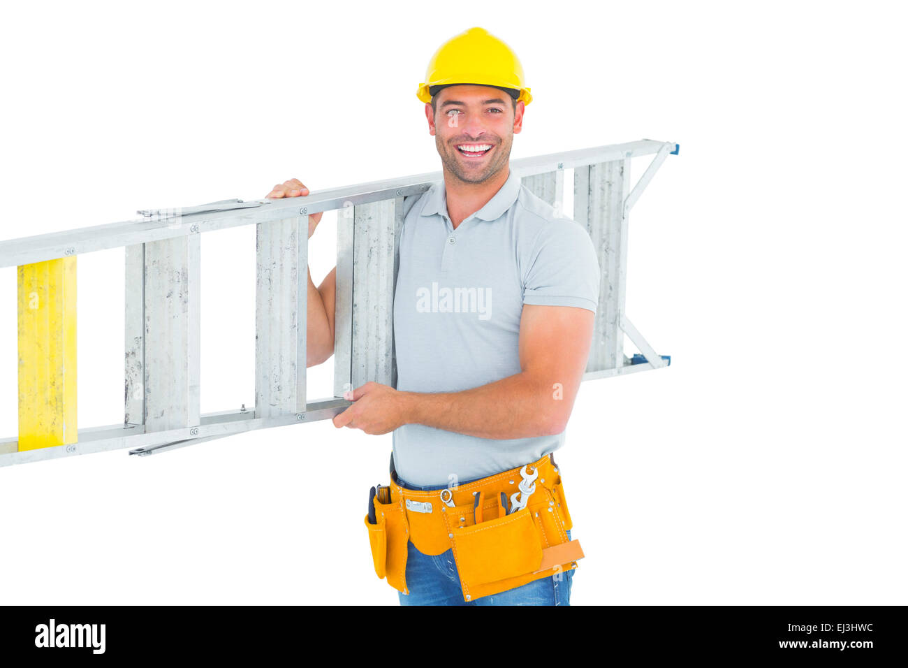 Portrait of smiling repairman carrying ladder Stock Photo - Alamy