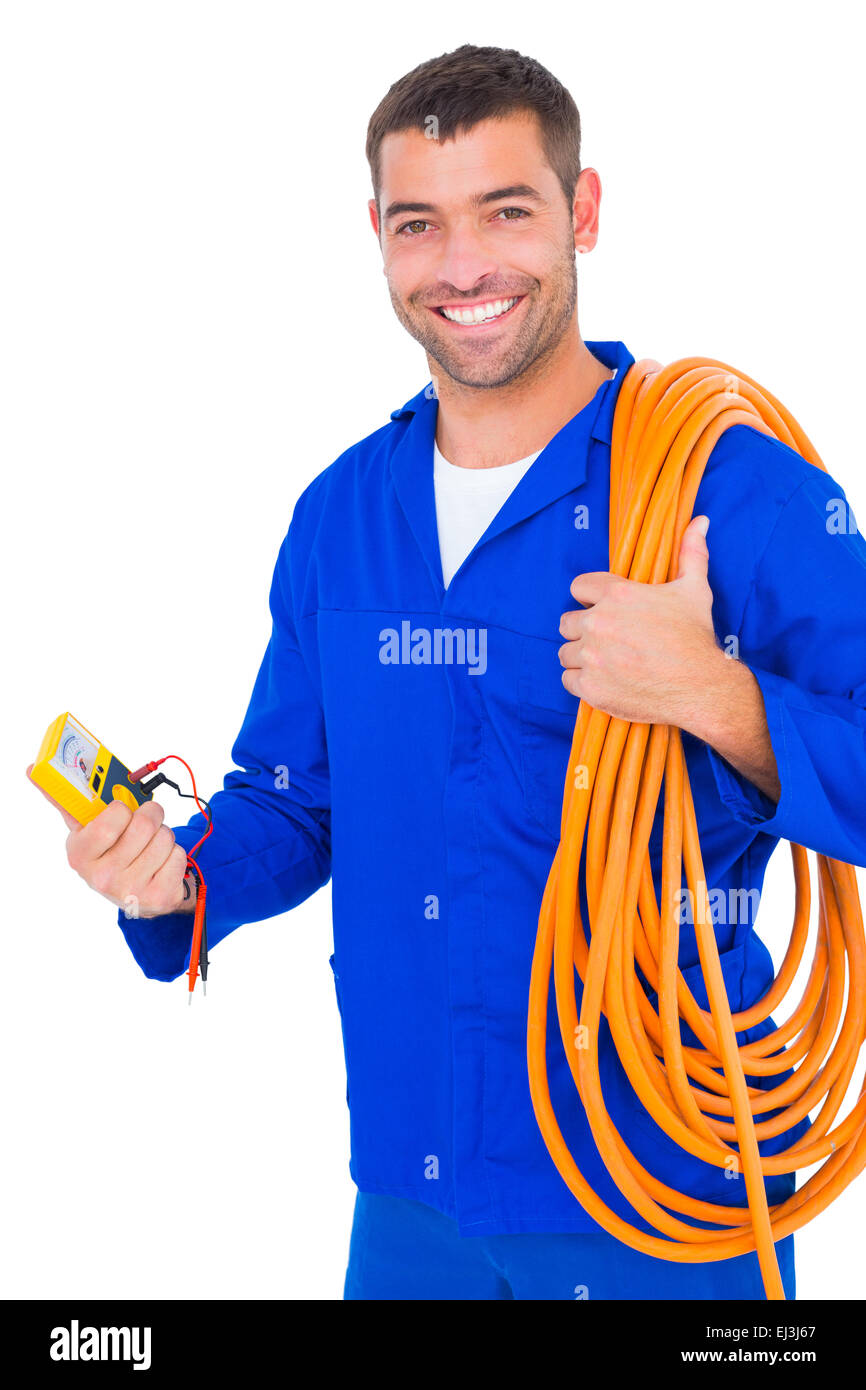 Smiling electrician with wire roll and multimeter Stock Photo - Alamy
