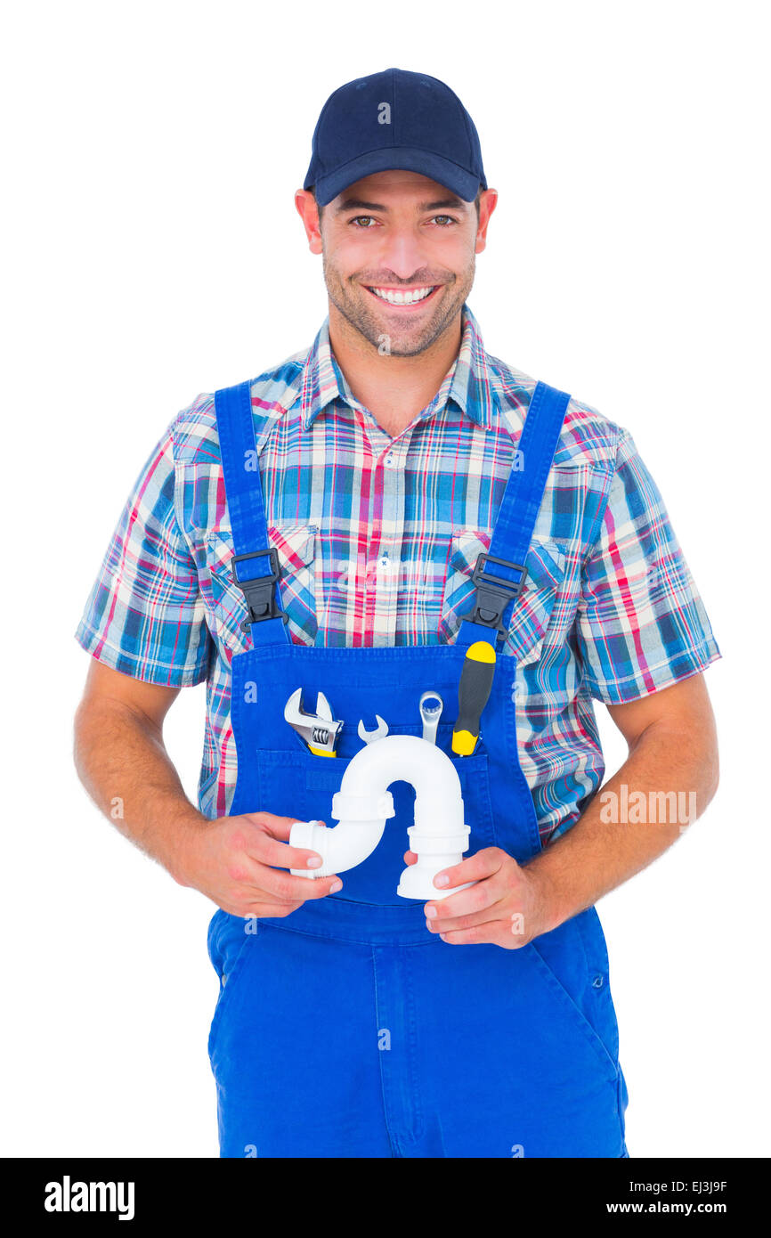 Portrait of handsome male plumber holding sink pipe Stock Photo - Alamy