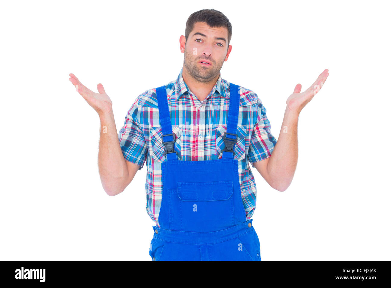 Confused handyman giving I dont know gesture Stock Photo - Alamy