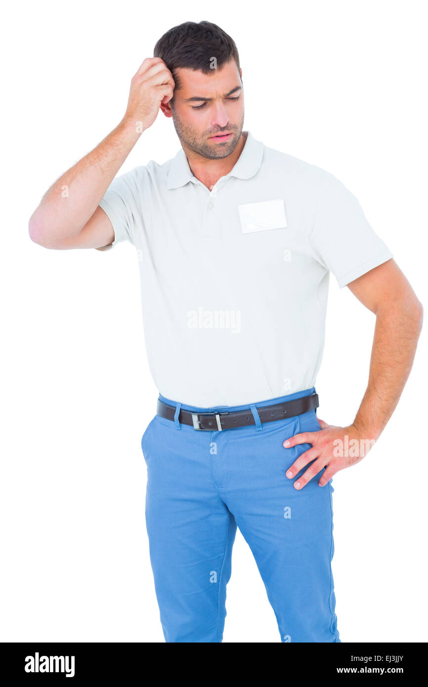 Confused male technician scratching head Stock Photo - Alamy